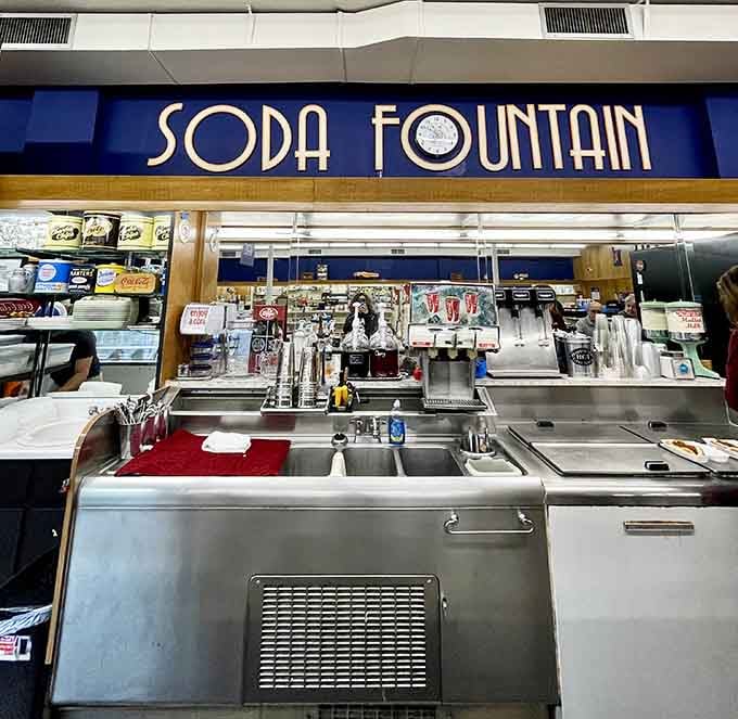 The gleaming soda fountain counter where magic happens, one scoop and one smile at a time, all day long.