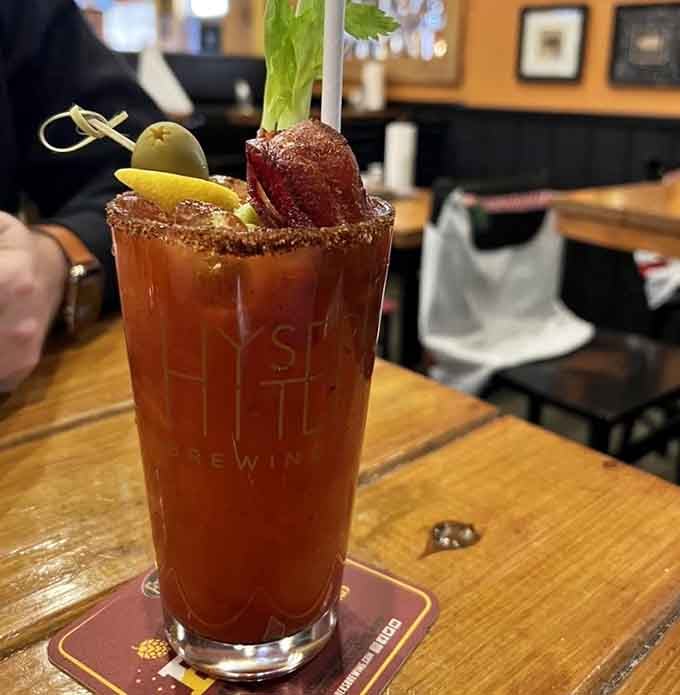 A Bloody Mary garnished so generously it's practically a meal, because why choose between drinking and eating when you can do both?