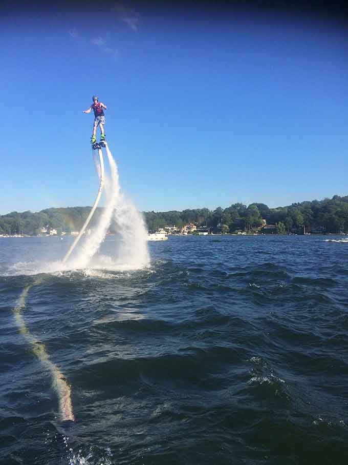 Someone's living their best James Bond fantasy on a flyboard, because why should kids have all the fun?