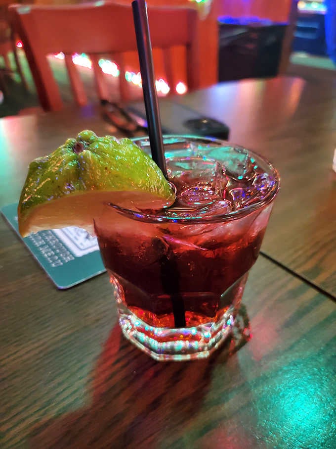 A vodka cranberry never looked so festive, perfectly at home in this perpetual holiday party.