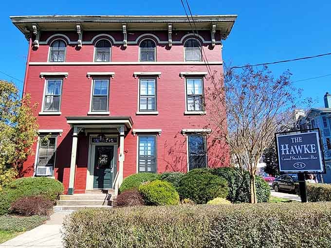 The pink facade of this historic building stands out like a beacon for anyone seeking character in their architecture.