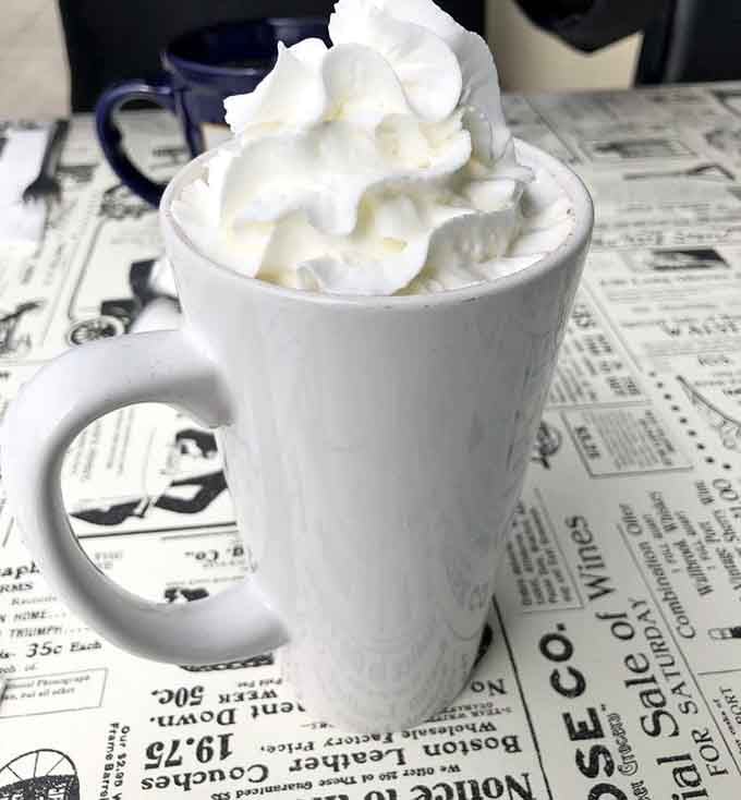 Hot chocolate topped with whipped cream peaks higher than your childhood dreams ever did.