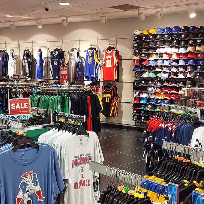 Basketball jerseys and caps create a sports fan's paradise tucked into this mountain outlet center.