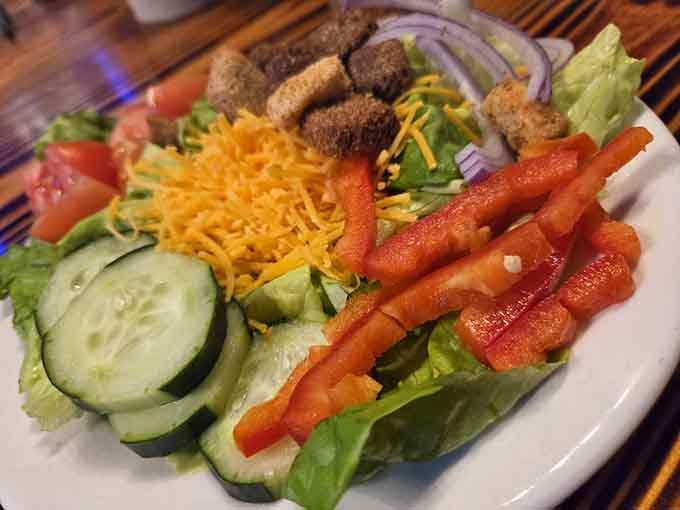 A house salad so colorful and fresh, it almost makes you forget you're here for the steak. Almost.