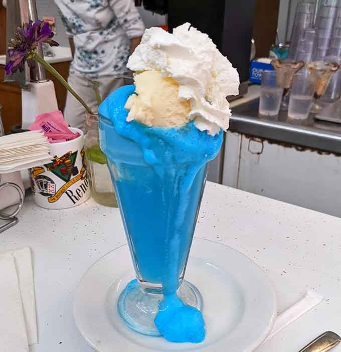 Electric blue and topped with vanilla ice cream, this bubble gum float is childhood in a glass, no time machine required.