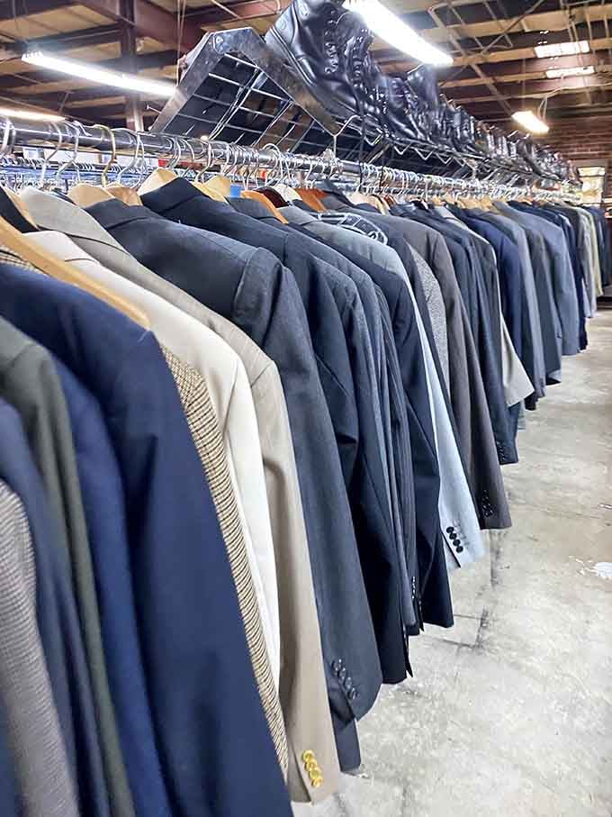 Rows of blazers hang like a gentlemen's club from the Rat Pack era, ready to class up any wardrobe.