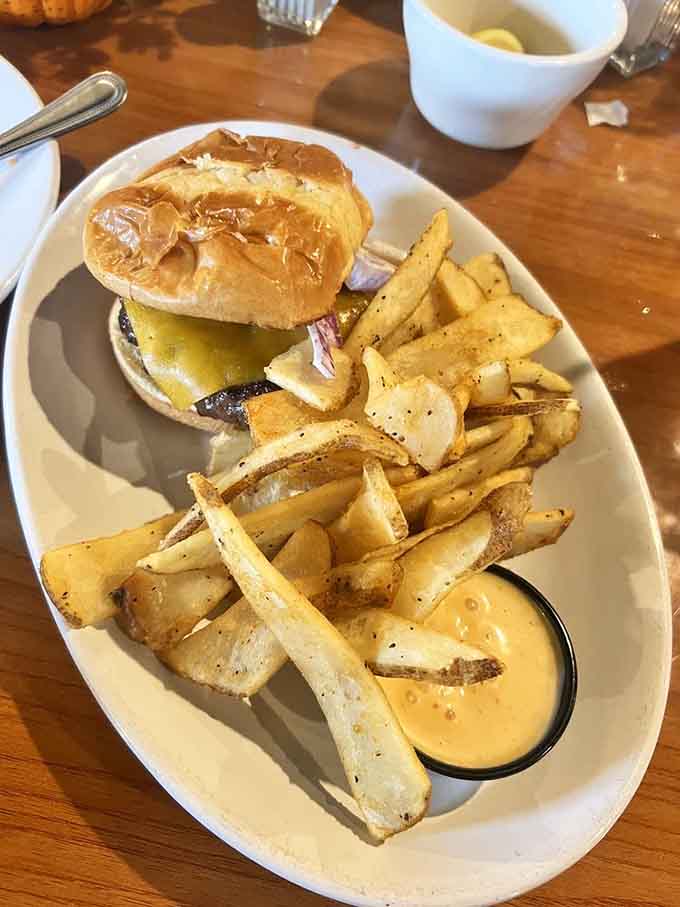This burger with its golden fries and special sauce is comfort food elevated to an art form worth celebrating.