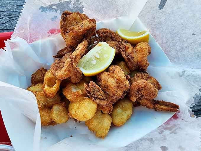 Cheese curds meet fried shrimp in a combination that would make any Midwesterner weep tears of pure happiness.