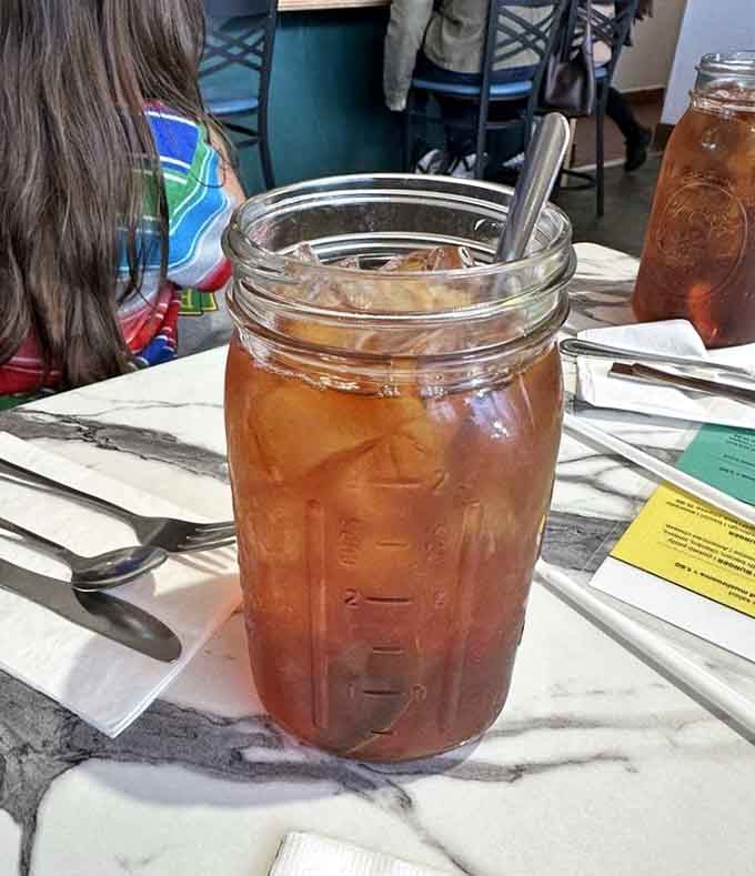 Mason jar iced tea served the way it should be: cold, refreshing, and big enough to last through your meal.