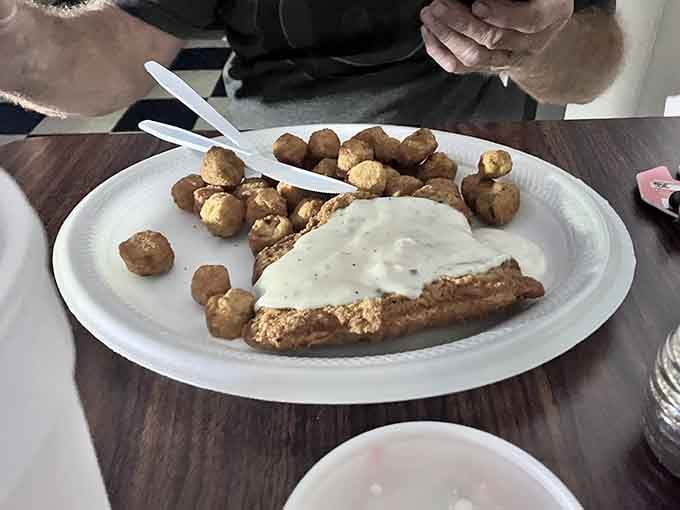 Country fried steak with gravy that could make even the grumpiest deputy crack a genuine smile.