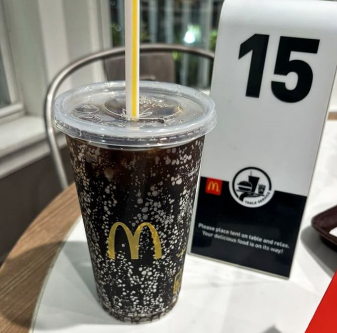 Sipping soda beneath period architecture makes you feel like a founding father with surprisingly modern beverage preferences, really.