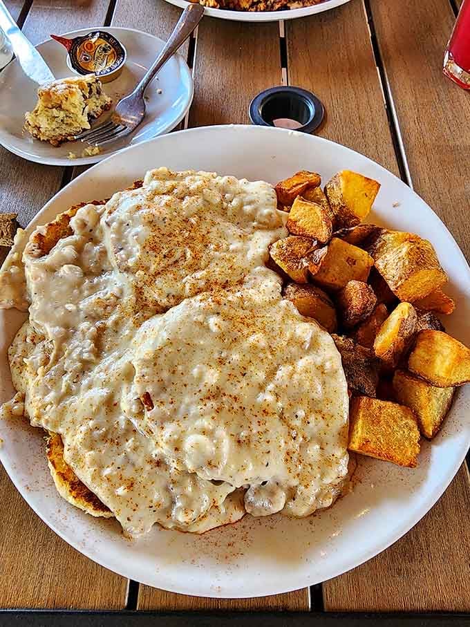 Biscuits and gravy so generous they could feed a small army, or one very hungry person with excellent taste.