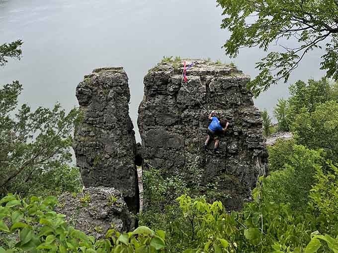 Brave climbers scale the famous Twin Sisters rock formation, proving age is just a number when adventure calls your name.