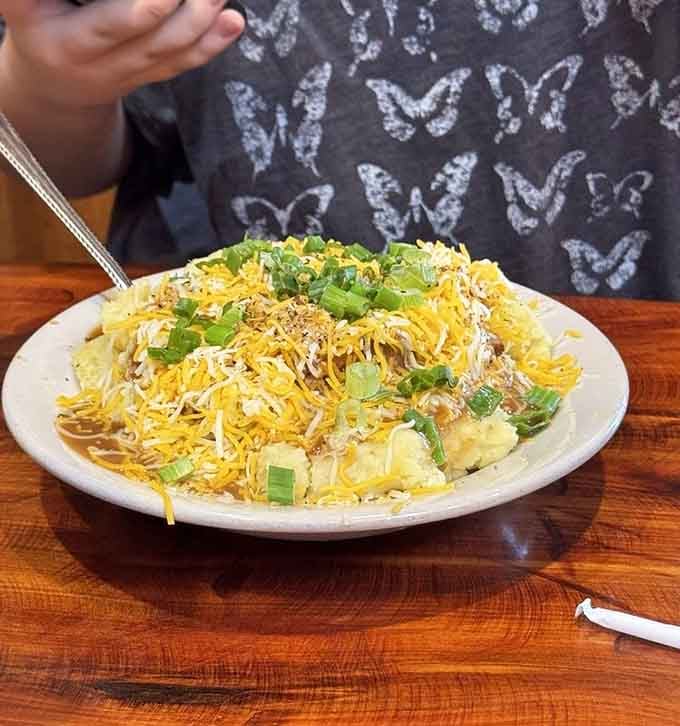 Brisket and mashed potatoes together create the kind of comfort food that makes everything else seem like practice rounds.