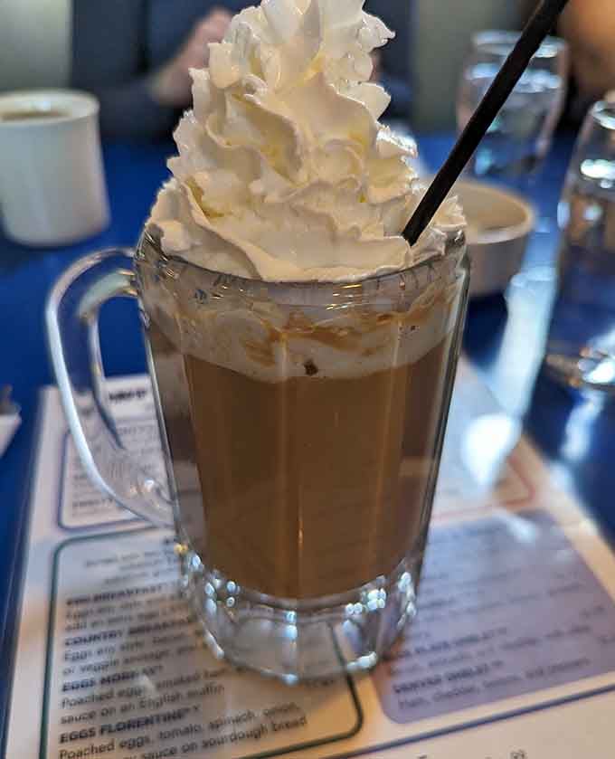 Irish coffee topped with enough whipped cream to make your cardiologist schedule an intervention, worth every sip.
