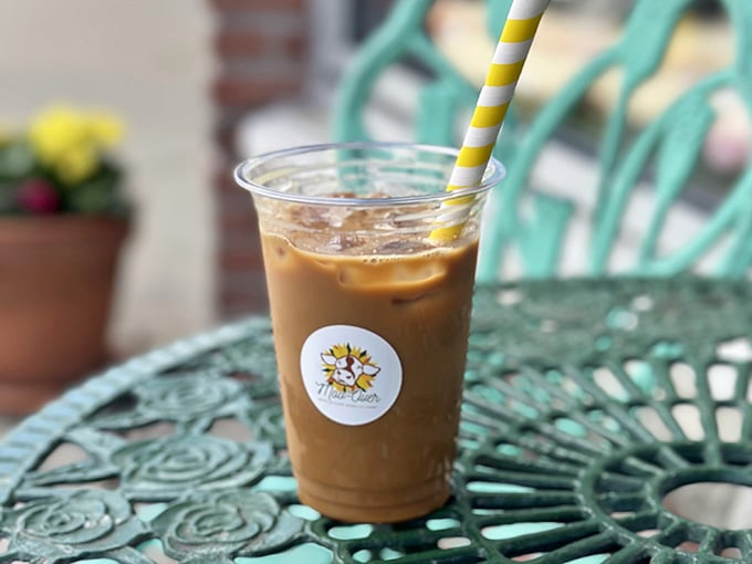 Iced coffee on a sunny patio tastes like summer freedom, especially when you're not worried about ingredients.