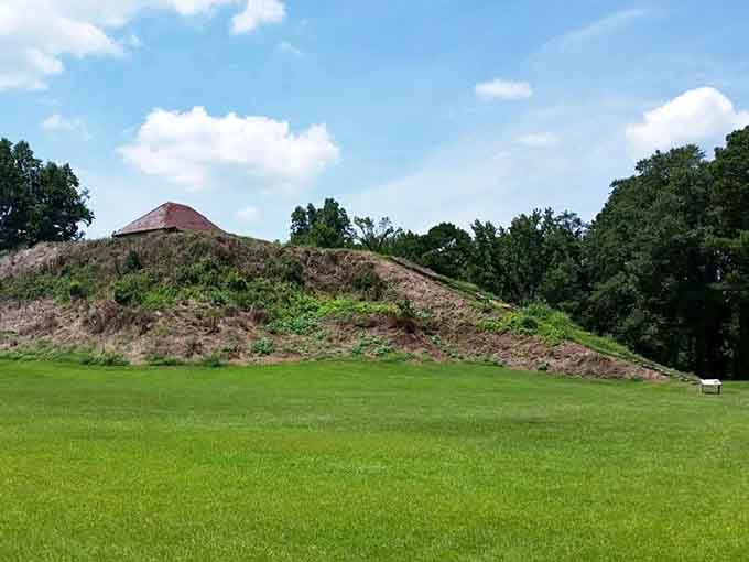 Mound B rises like nature's skyscraper, topped with a reconstructed temple that hints at former glory.