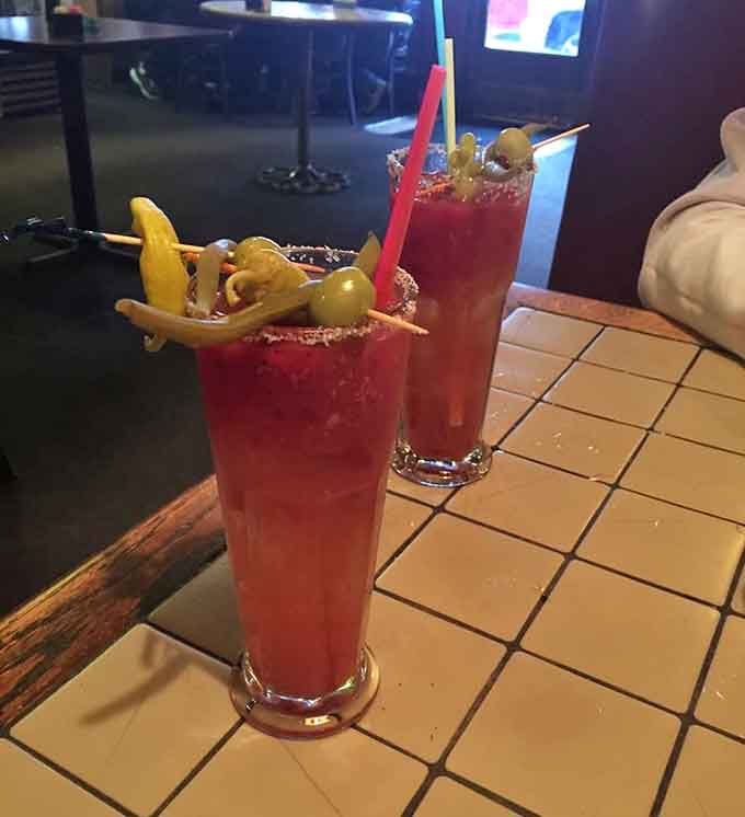 Those Bloody Marys come loaded with enough garnishes to qualify as both beverage and appetizer in one spectacular glass.