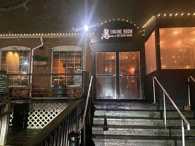 Mystic Engine Room: Evening lights transform this spot into something magical, where craft cocktails taste better when buildings glow like this.