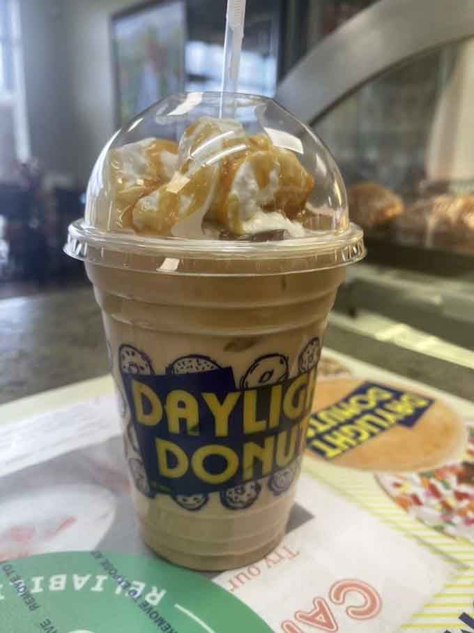 Whipped cream and caramel swirls in a cup that's basically dessert pretending to be a beverage.