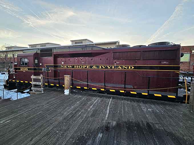 The New Hope & Ivyland Railroad car waits patiently, ready to transport passengers through scenic countryside like it's done for generations.