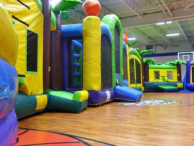 Inflatable bounce houses transform ordinary children into airborne acrobats defying gravity with pure joy and laughter.