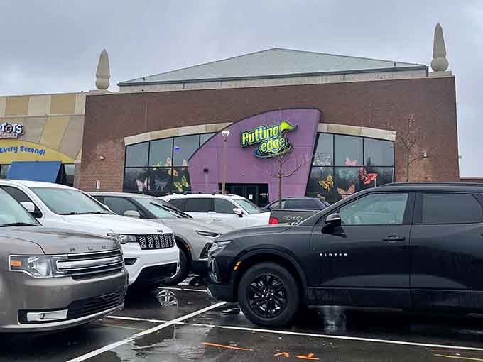 Even the parking lot can't contain the excitement of what's waiting inside those purple walls.