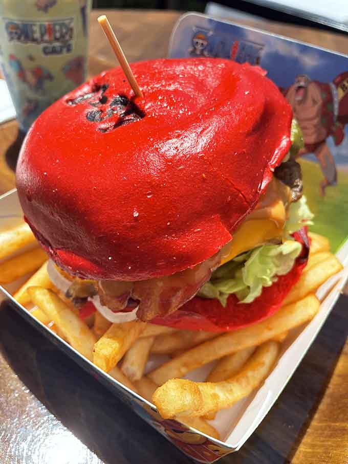 A crimson bun that bold deserves its own wanted poster, stacked high with all the fixings any pirate craves.