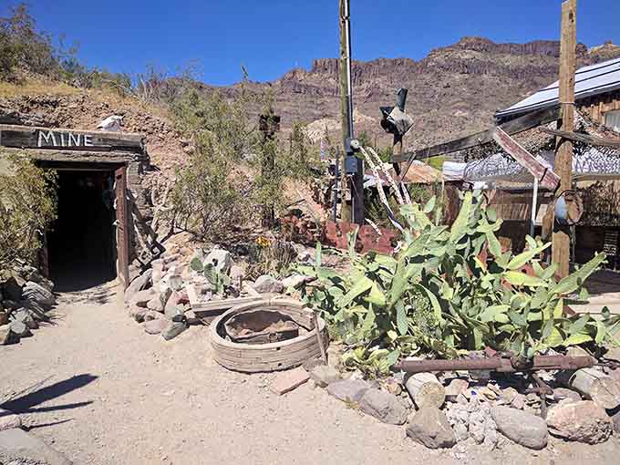 The museum building's weathered wood siding tells its own story, each plank a chapter in Oatman's colorful past and present.