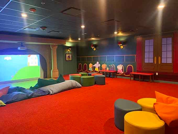 A cozy cinema space where families gather to watch episodes on the big screen, complete with character seating.