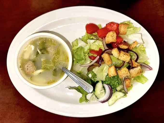 Italian wedding soup paired with a garden-fresh salad proves you can have vegetables and still enjoy your meal.