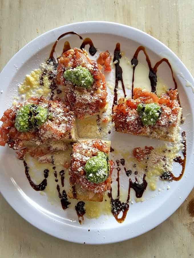 Toasted bread topped with fresh tomatoes and basil, because sometimes the simplest things are the most sublime.