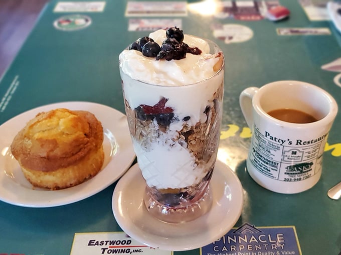 Yogurt parfait, a fresh muffin, and strong coffee: the holy trinity of starting your morning absolutely right.