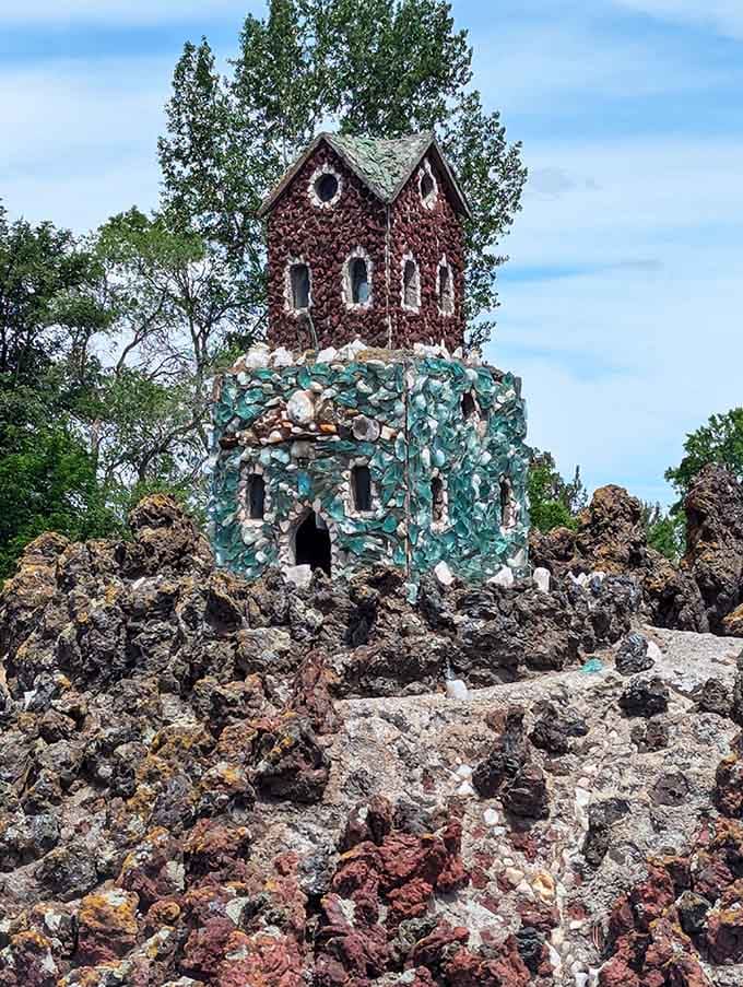 Turquoise stones create a jewel-toned tower that sparkles like someone bedazzled a building with nature's finest bling.