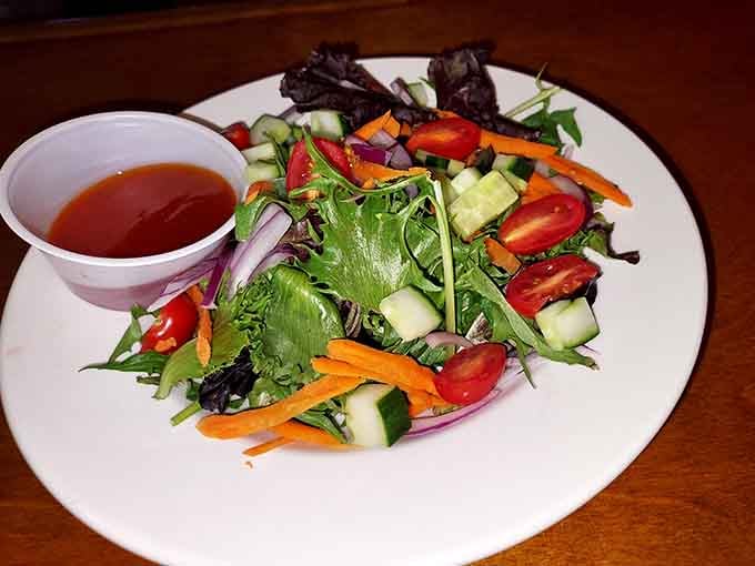 Fresh vegetables arranged so beautifully you almost feel virtuous, until you remember that burger you're about to order.