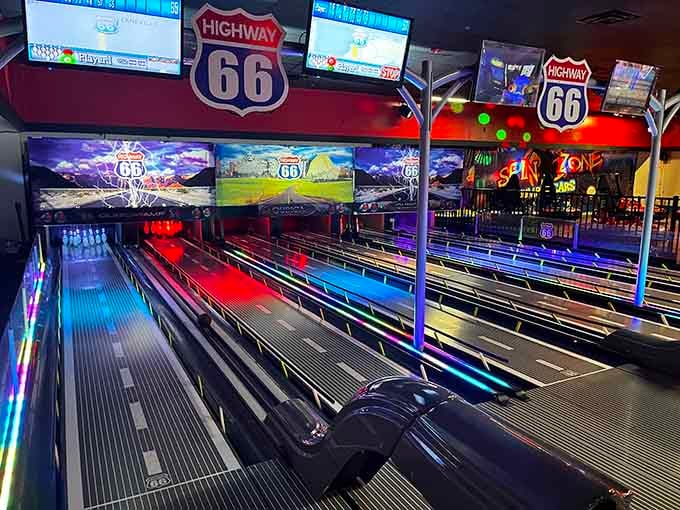 Bowling lanes stretch out beneath Highway 66 signs, merging Americana with strike-seeking satisfaction.