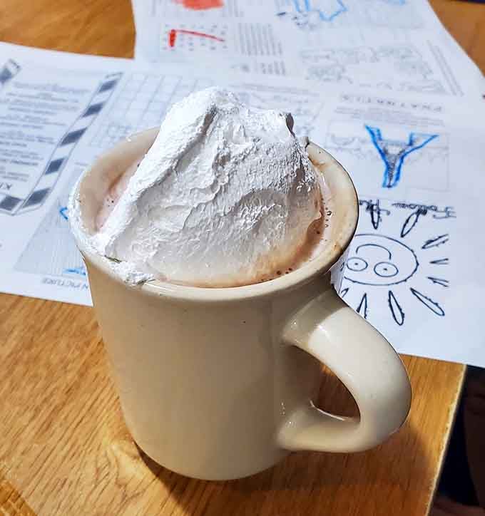 Hot chocolate piled high with whipped cream&mdash;because sometimes you need dessert in a mug, and that's perfectly acceptable.