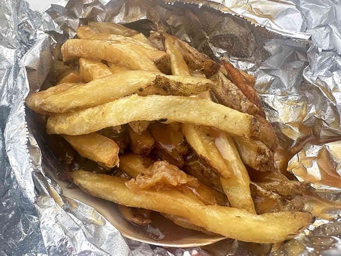 Golden fries with gravy: because sometimes potatoes need a little extra love and moisture.