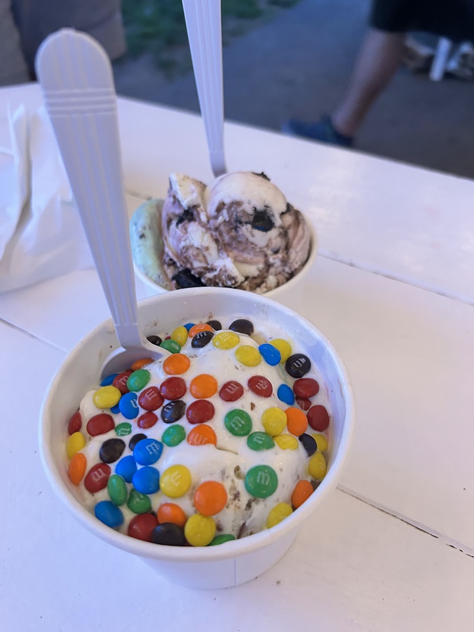 M&Ms scattered across vanilla like colorful confetti celebrating your excellent life choices and impeccable taste.