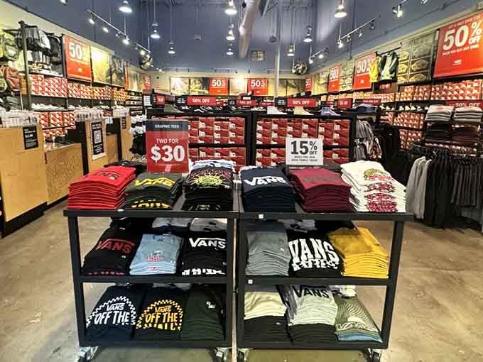 Vans displays stacked like a rainbow of casual cool, proving comfort and style can coexist harmoniously.