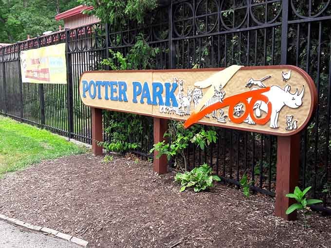 The welcoming signage promises adventure ahead, featuring playful animal illustrations that set the perfect tone for your visit.