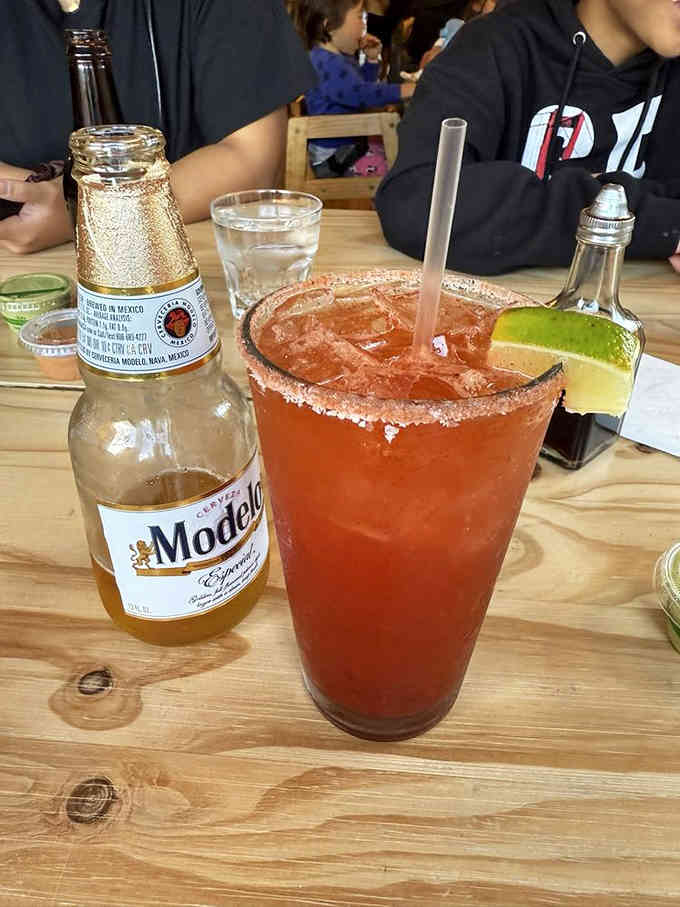 A frosty margarita pairs surprisingly well with fish and chips, proving that culinary rules are meant to be broken.
