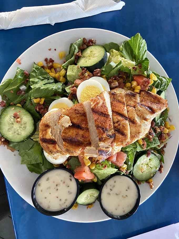 A salad this loaded with grilled chicken, eggs, and fresh vegetables makes healthy eating feel like a reward, not punishment.