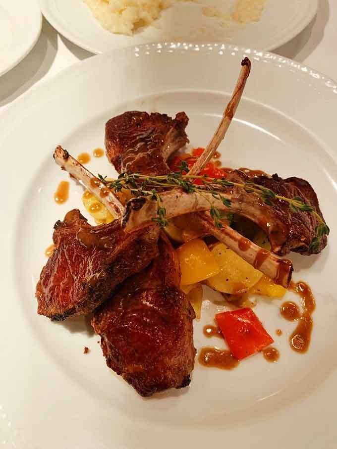 Lamb chops cooked to perfection with vegetables that actually taste like vegetables, not an afterthought on the plate.