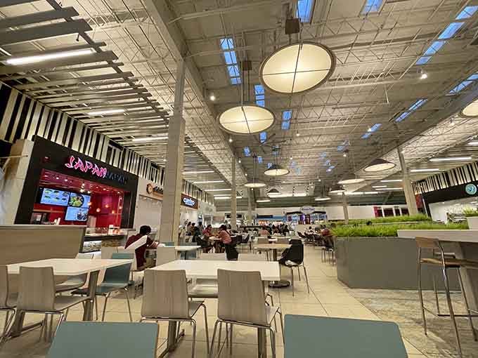 The spacious food court offers respite for weary shoppers, with modern seating that actually looks comfortable for once.