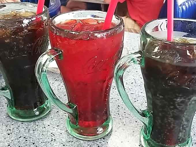 Colorful sodas in vintage glasses remind us that presentation matters, even for simple refreshments done right.