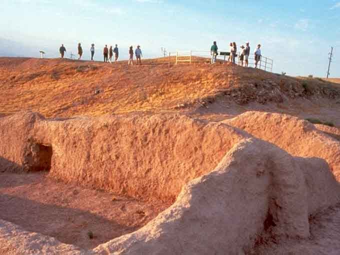 Visitors gather atop earthen mounds built by hand, no heavy machinery or coffee breaks required.
