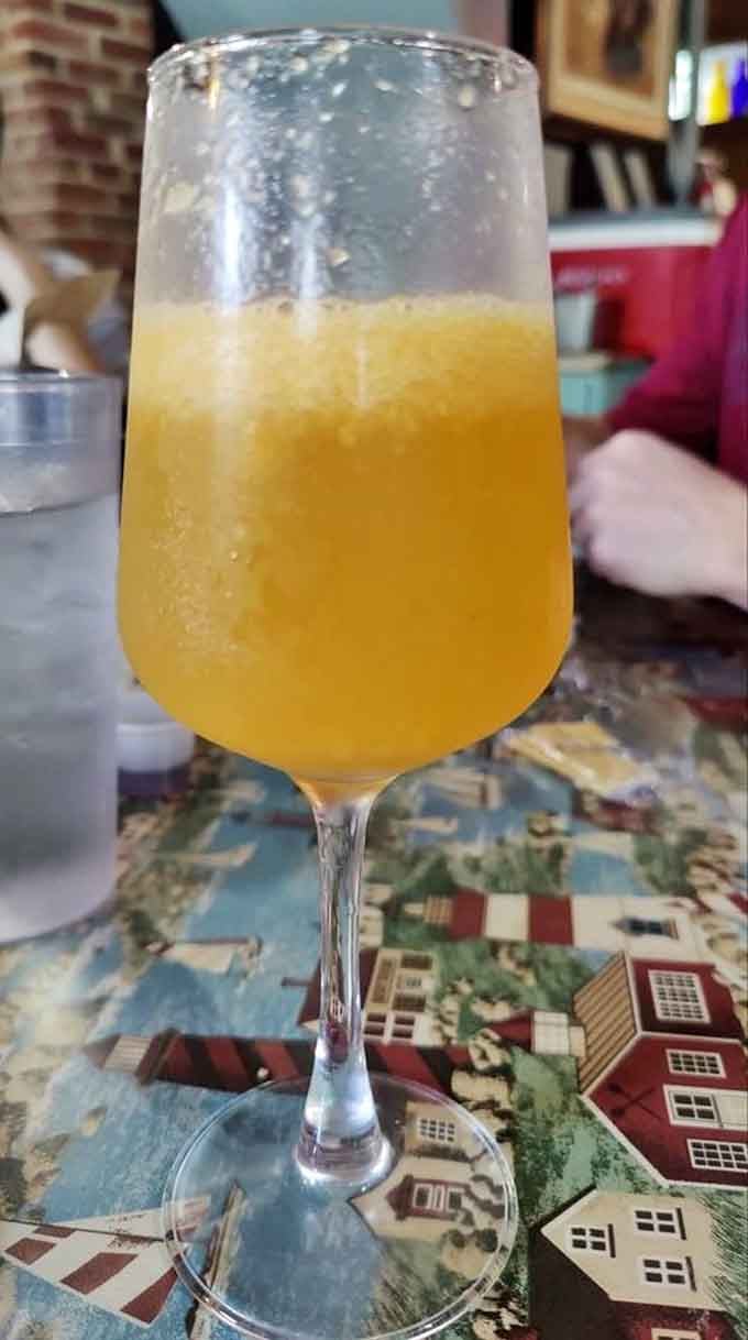 A frosty mimosa adds a touch of brunch elegance to your coastal seafood adventure.