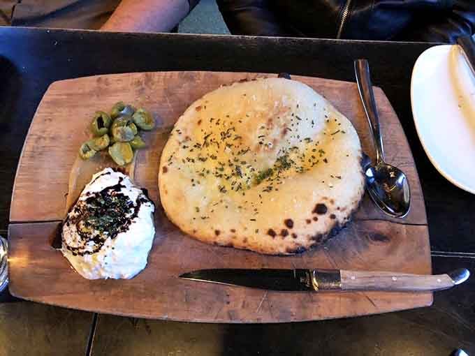 Flatbread so good it makes you question everything you thought you knew about simple carbohydrates and happiness.