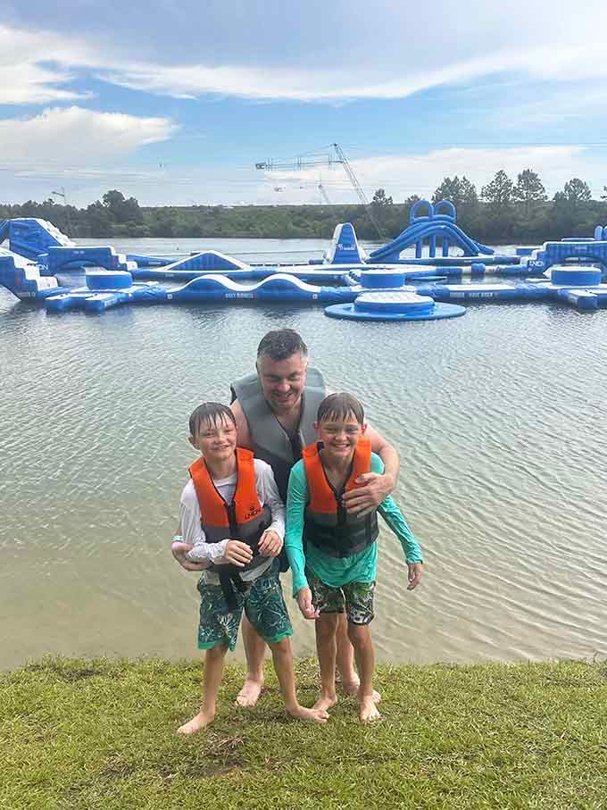 Smiles this big only happen when you've survived the course and lived to tell the tale.